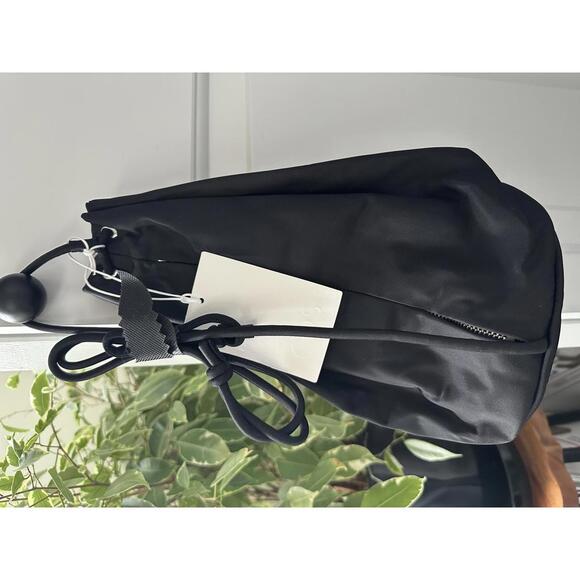 COS | Bags | Cos Drawstring Crossbody Bag Nylon Black Nwt | Poshmark